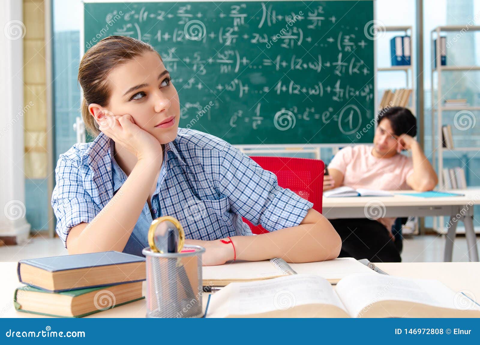 The Young Students Taking the Math Exam in Classroom Stock Photo ...