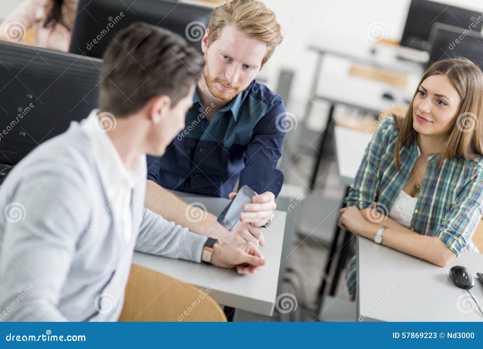 Young Students Talking in a Classroom Stock Image - Image of male ...