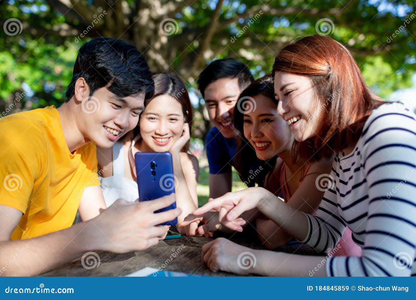 Young Students Use Smartphone Stock Image - Image of male, campus ...