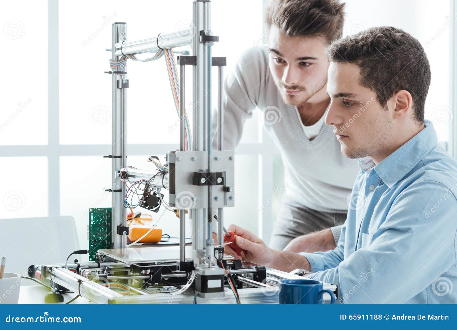Young Students Using a 3D Printer Stock Photo - Image of design ...