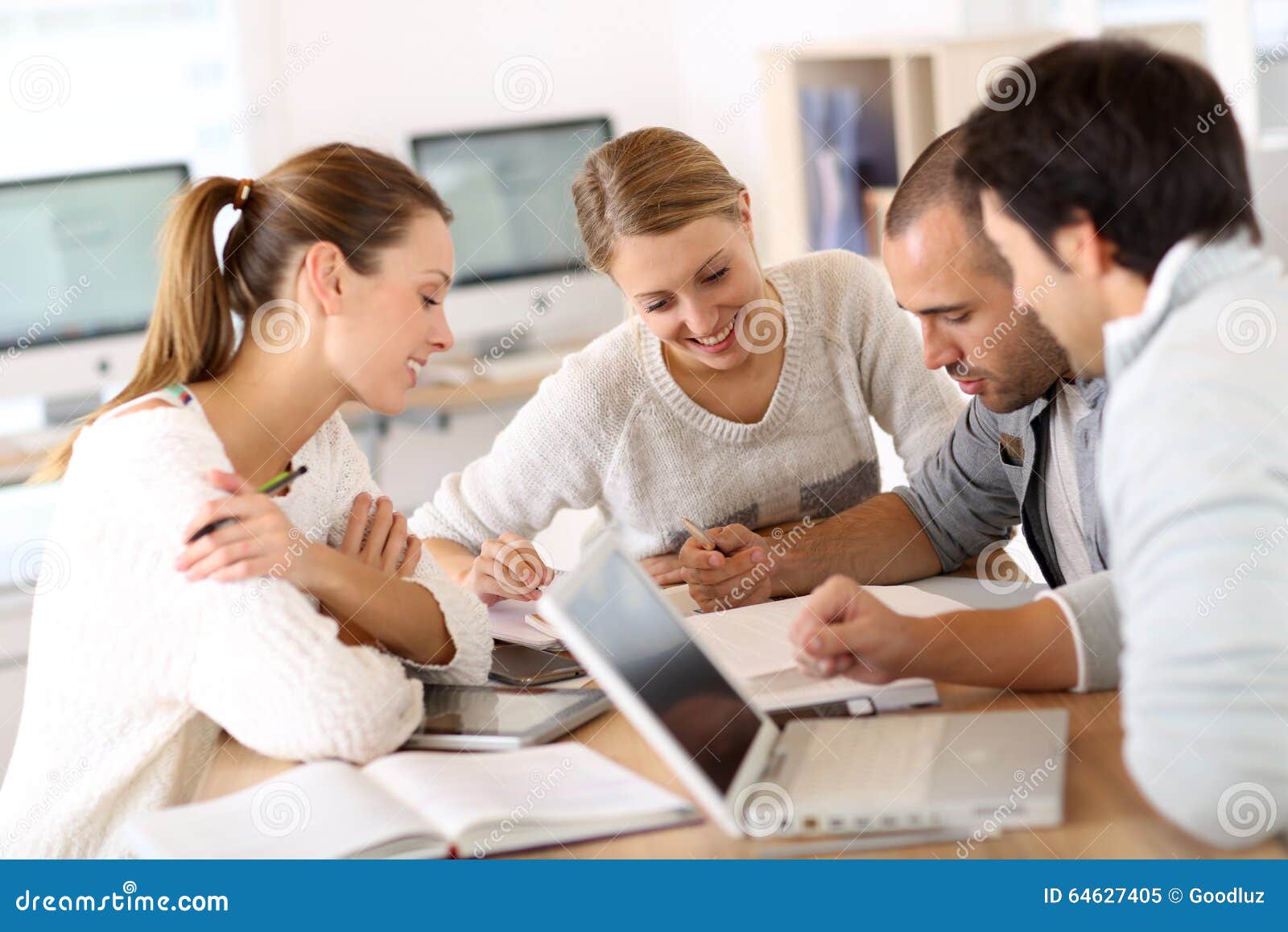 Young Students Working Together on a Project Stock Image - Image of ...
