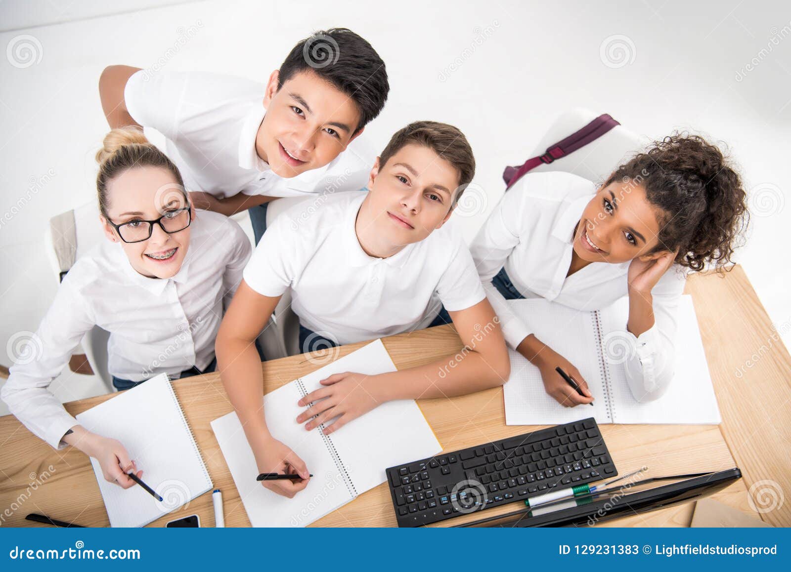 Young Students Writing Something Stock Image - Image of teenagers ...
