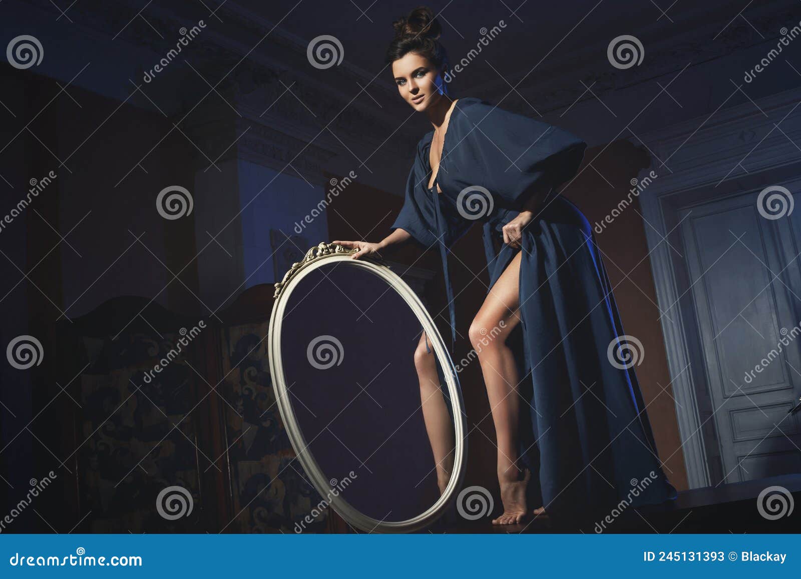 Young Stunning Model Posing with a Mirror Stock Image - Image of frame ...