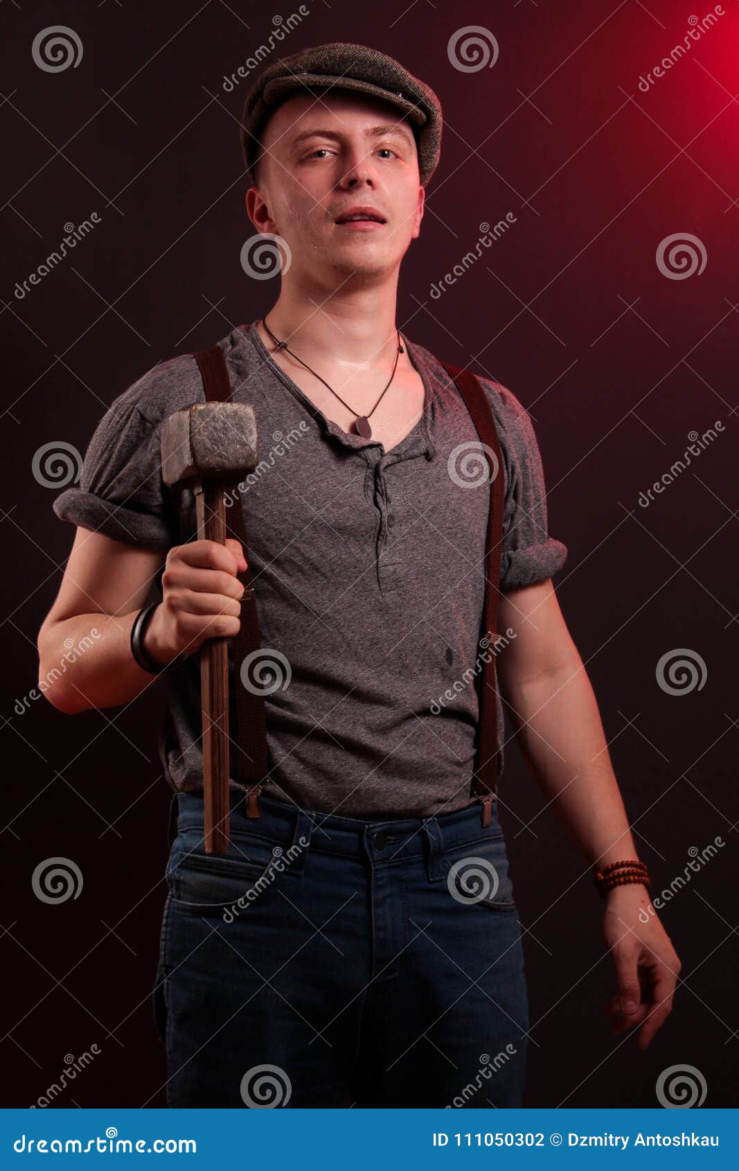A Young Stylish Guy with a Big Hammer Stock Photo - Image of trendy ...