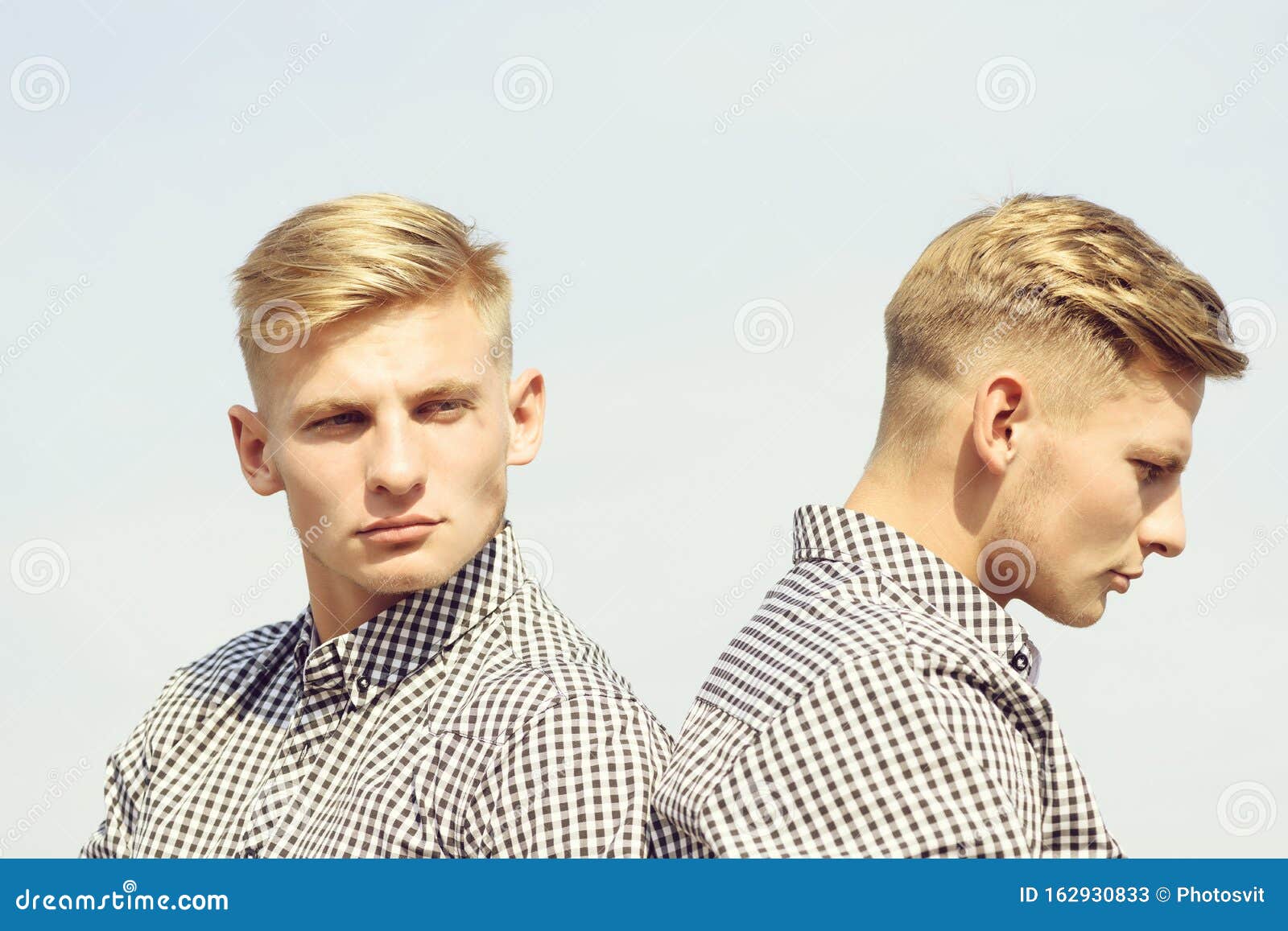 Handsome Twins Posing with Serious Faces on Sky Background Stock Image ...