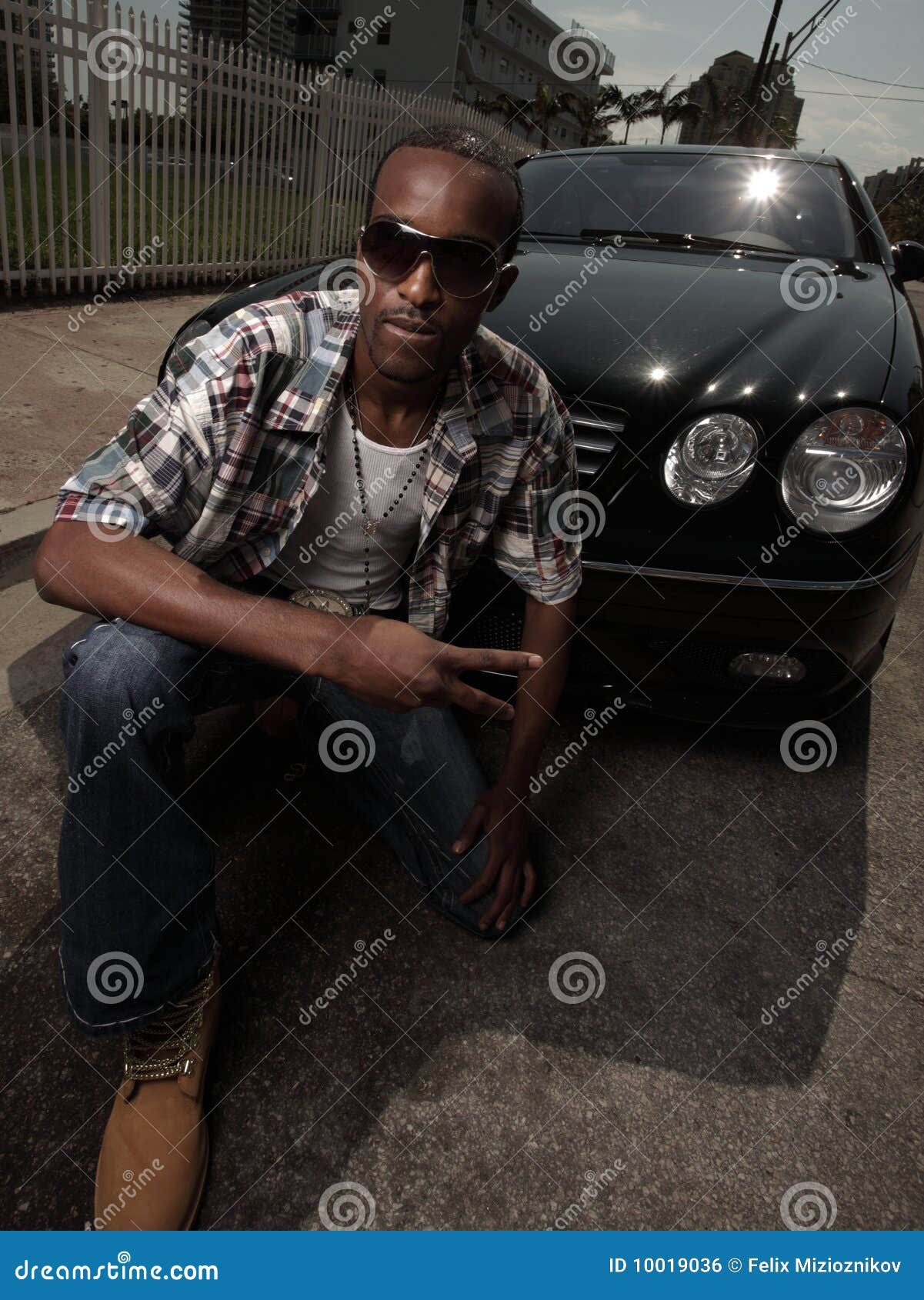 Young Stylish Male Posing by a Car Stock Photo - Image of front ...