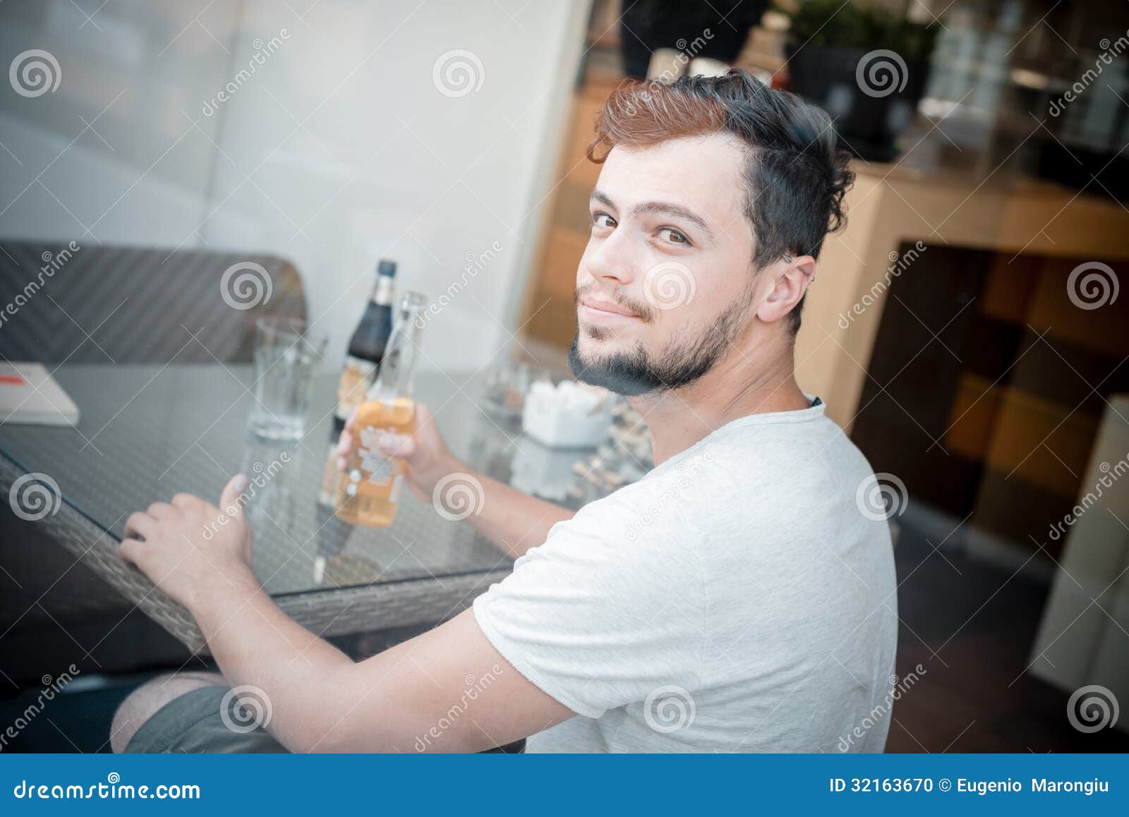 Young Stylish Man at the Bar Stock Photo - Image of modern, young: 32163670