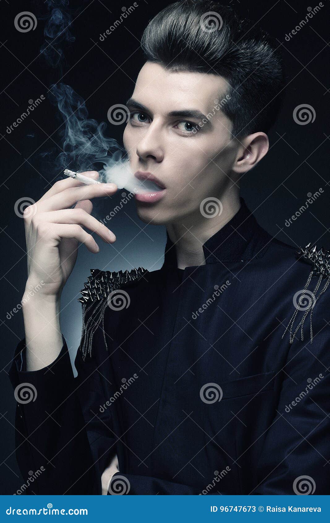 Young Stylish Man Smoking a Cigarette Stock Image - Image of blue ...