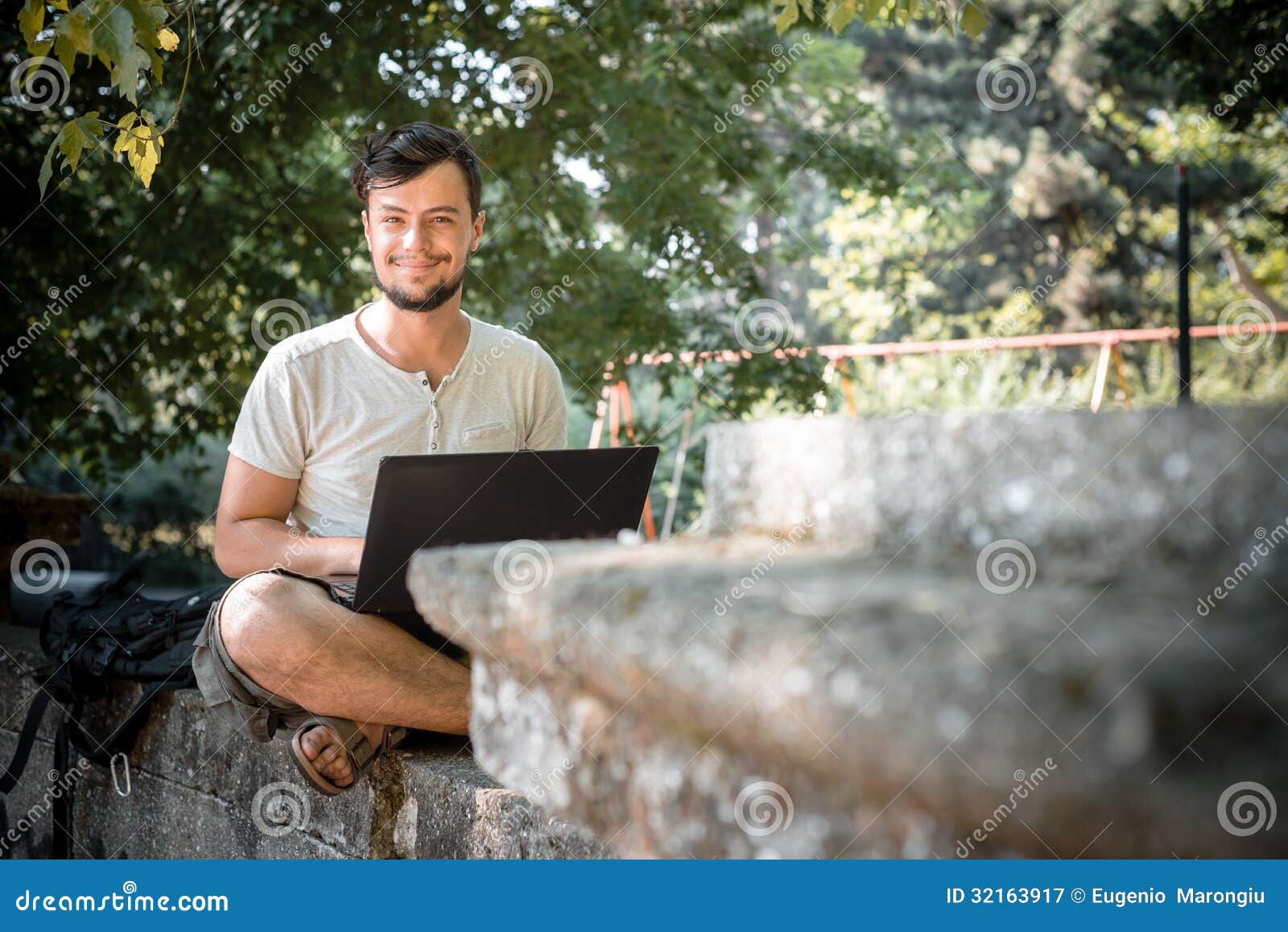Young Stylish Man Using Notebook Stock Image - Image of natural ...