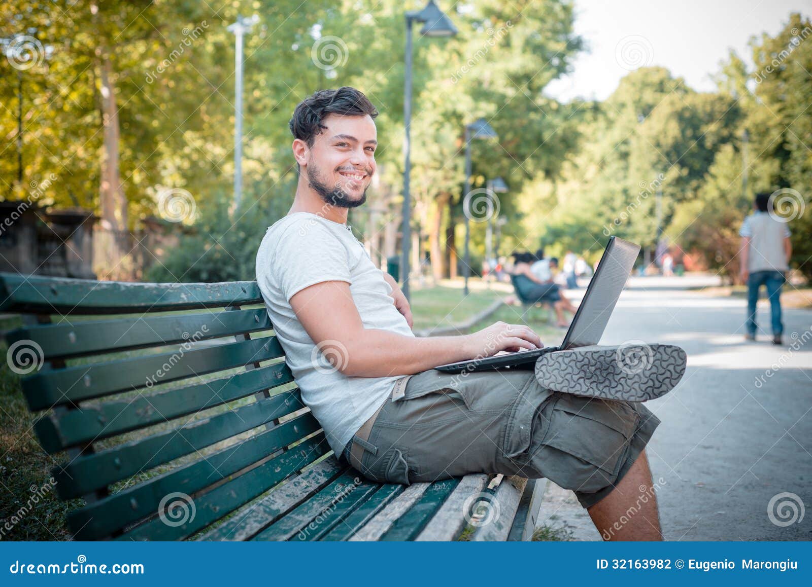 Young Stylish Man Using Notebook Stock Photo - Image of spontaneous ...