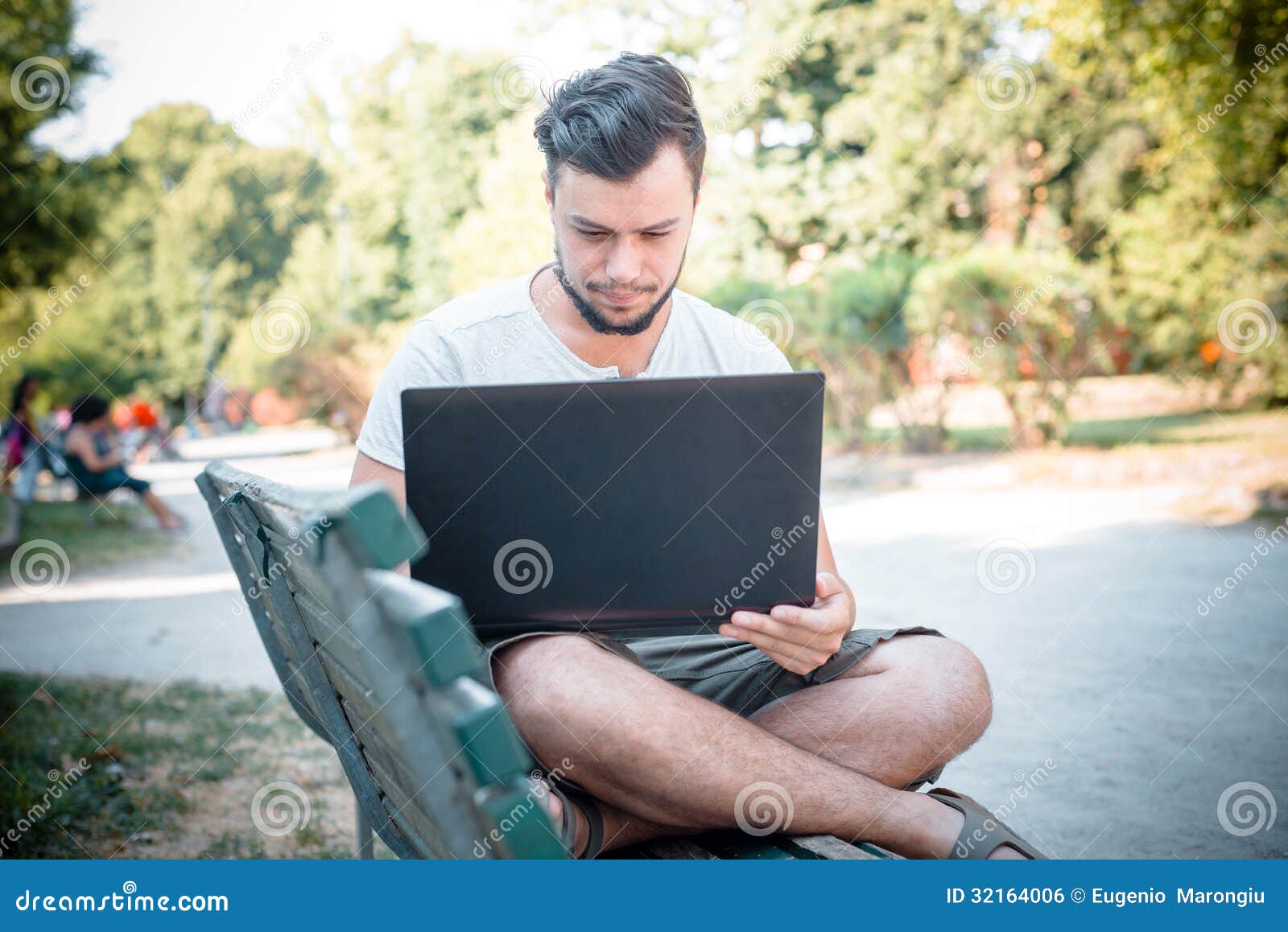 Young Stylish Man Using Notebook Stock Photo - Image of years, computer ...