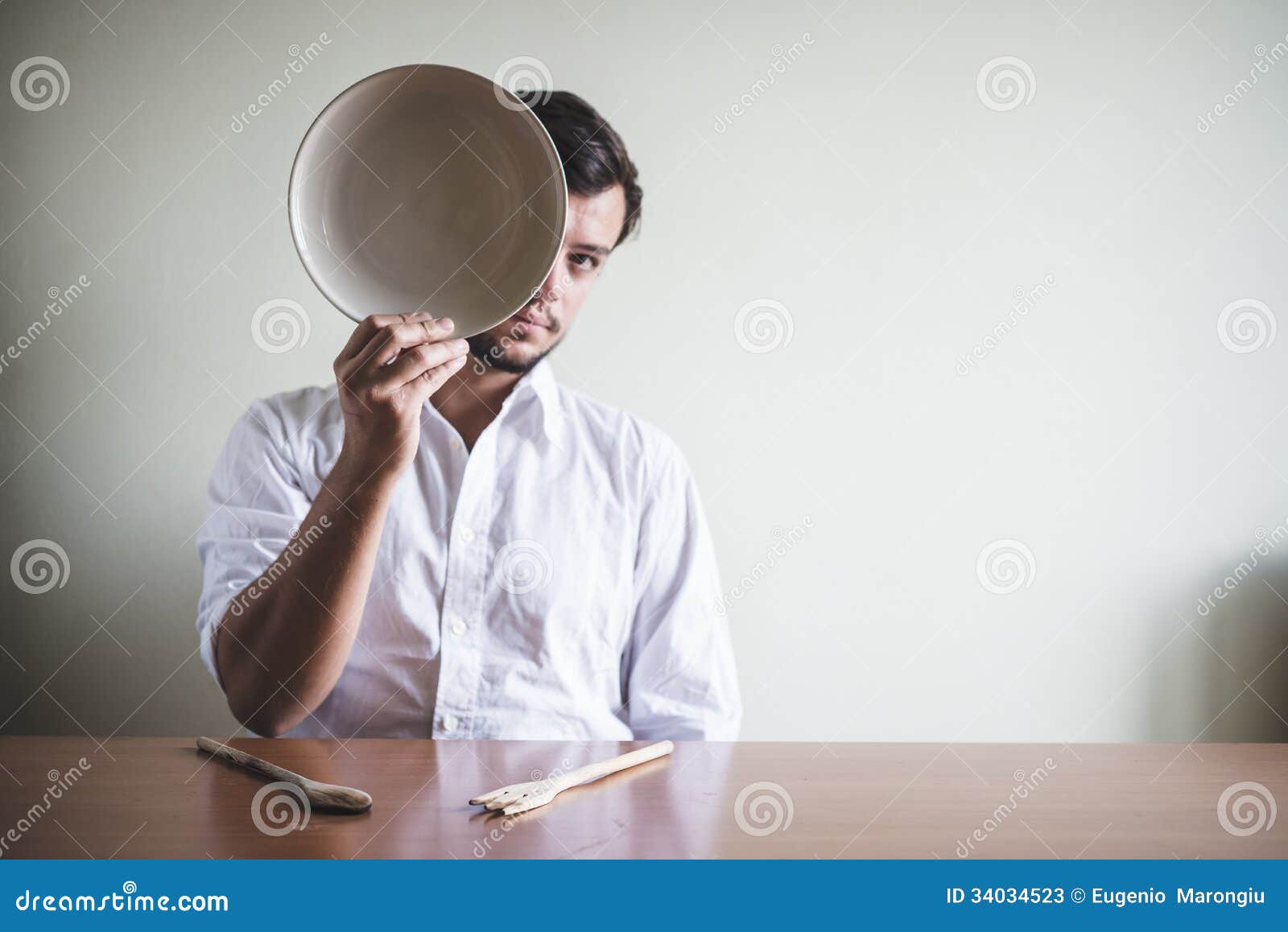 Young Stylish Man with White Shirt and Dish in His Face Stock Image ...