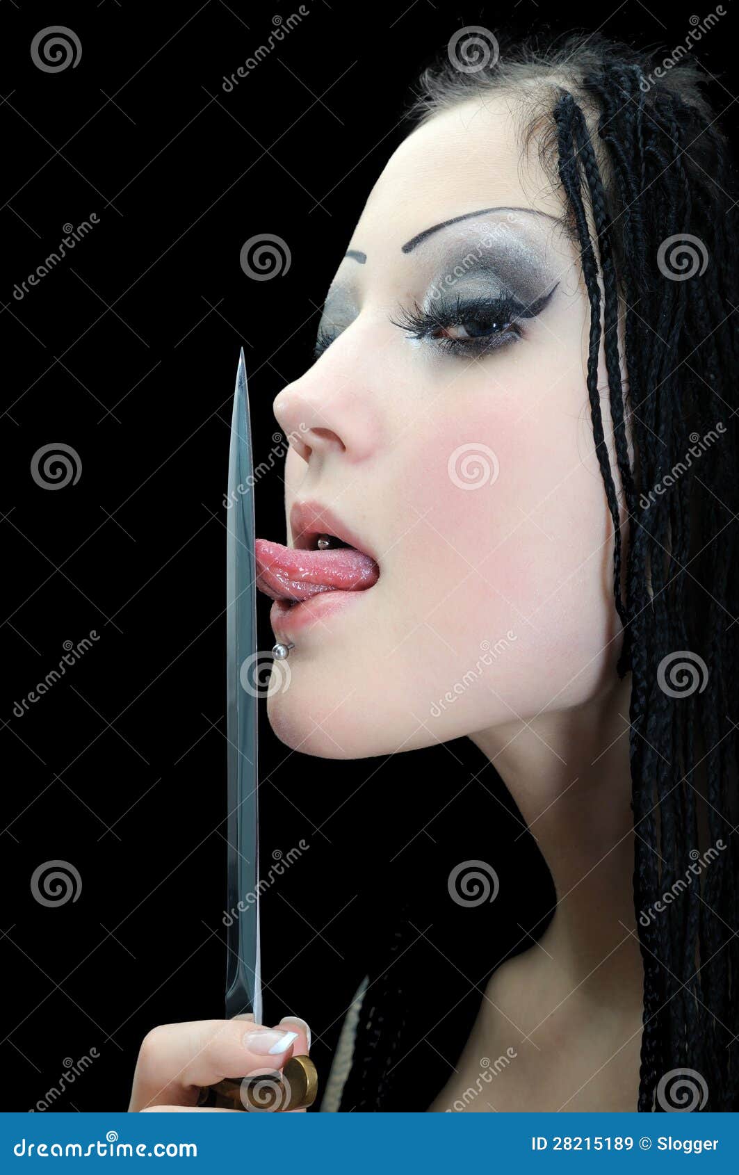 Young Stylish Woman with Dreadlocks, Licking a Dagger Stock Image ...