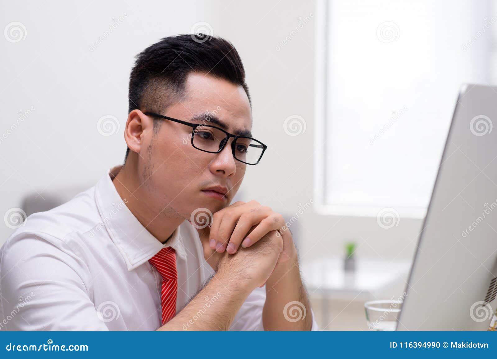 Young Stylish Worker at Office Working with Computer and Thinking How ...