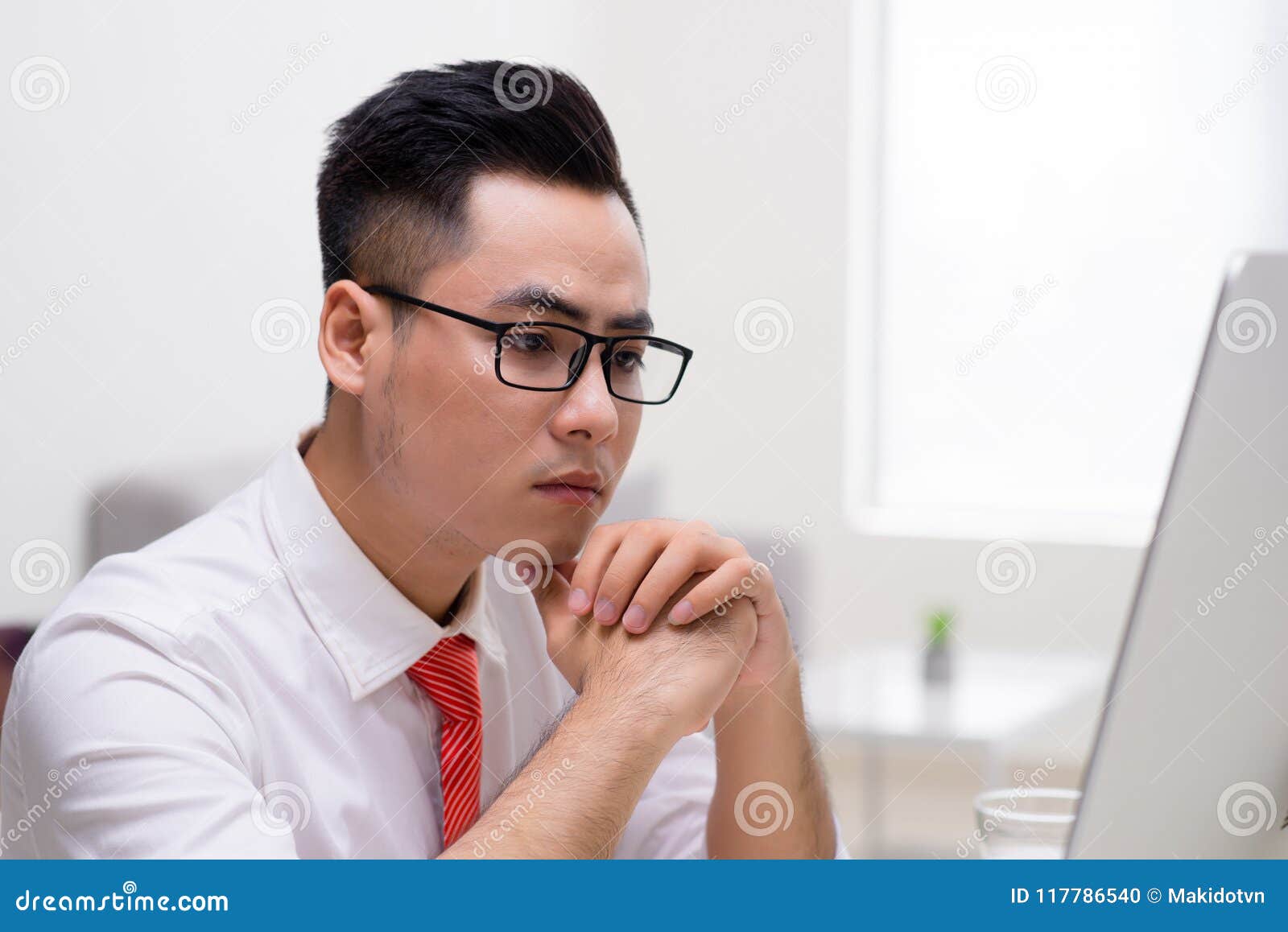 Young Stylish Worker at Office Working with Computer and Thinking How ...