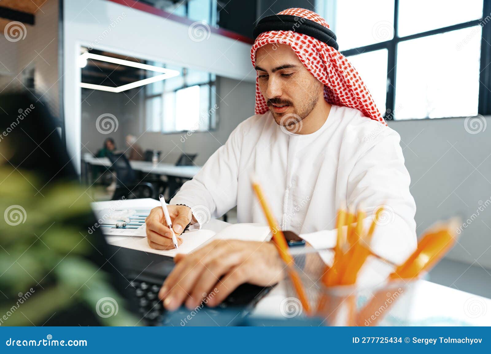 Young Successful Arab Businessman Working in the Office Stock Photo ...
