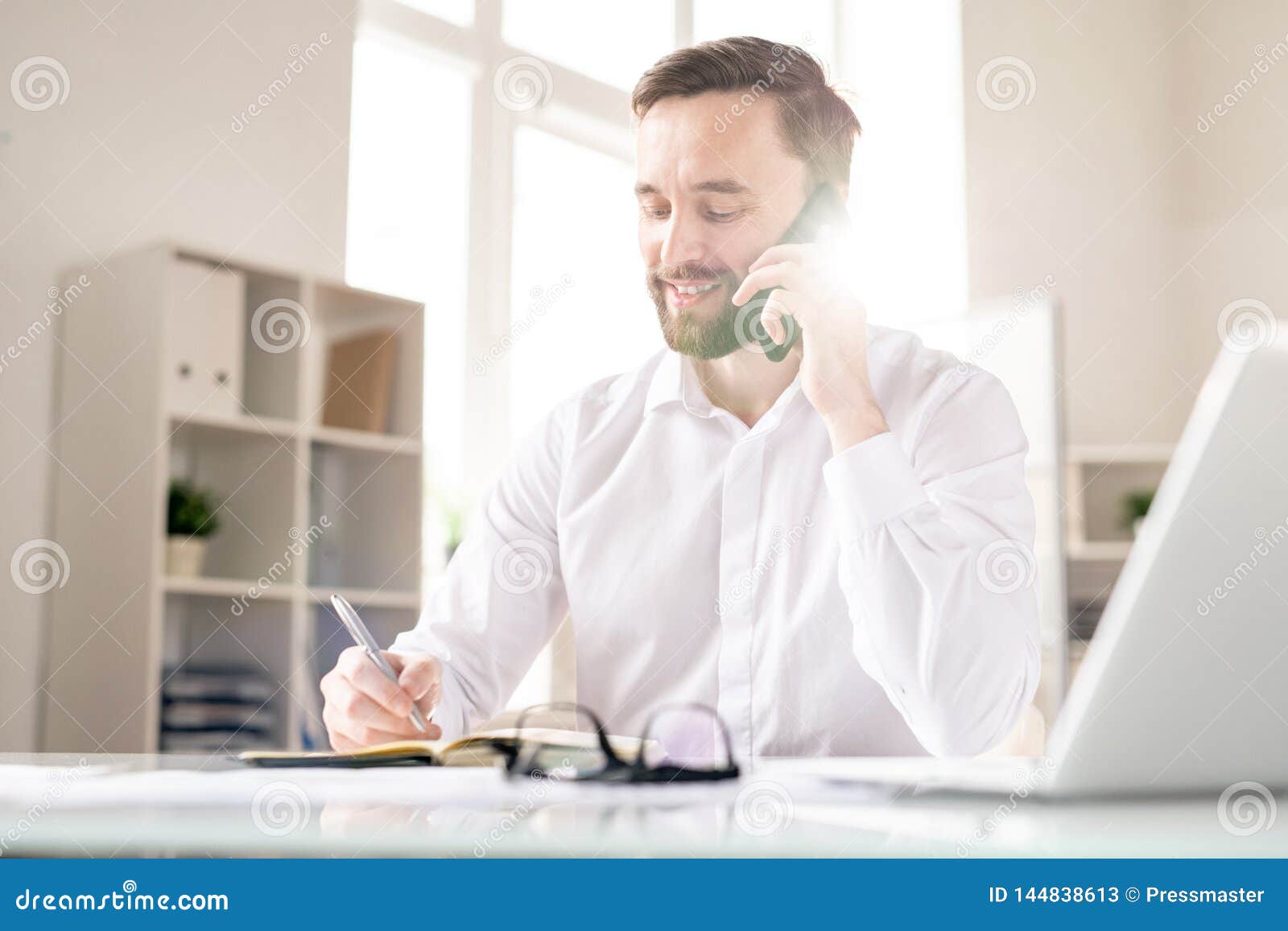 Man working in office stock image. Image of gadget, executive - 144838613