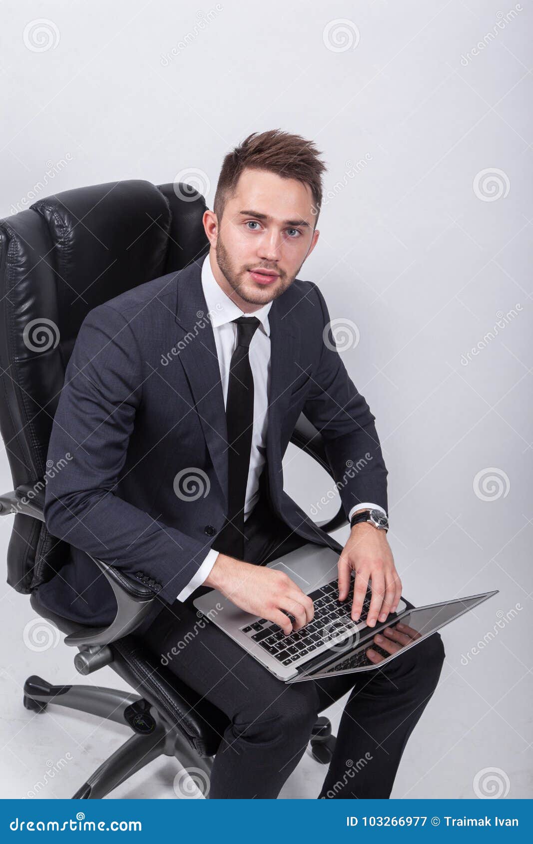 Young Successful Businessman Sitting in an Office Chair on a Whi Stock ... Young Successful Businessman Sitting in an Office Chair on a Whi Stock ...