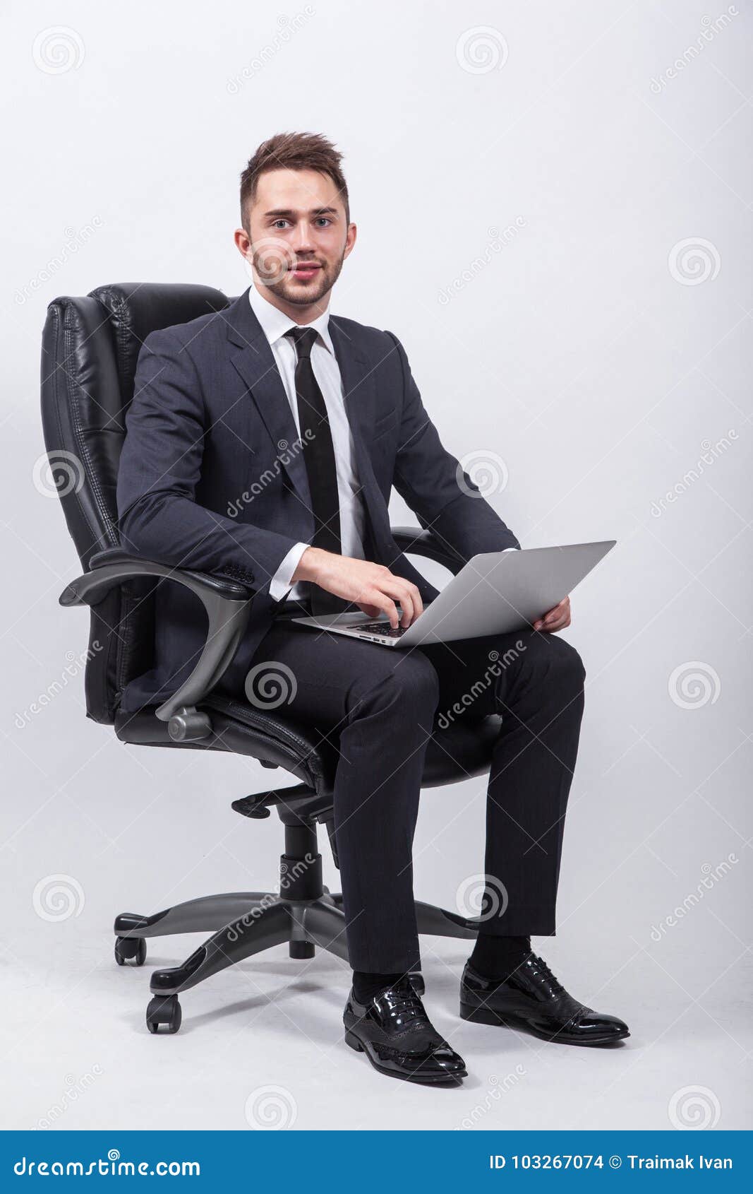 Young Successful Businessman Sitting in an Office Chair on a Whi Stock ... Young Successful Businessman Sitting in an Office Chair on a Whi Stock ...