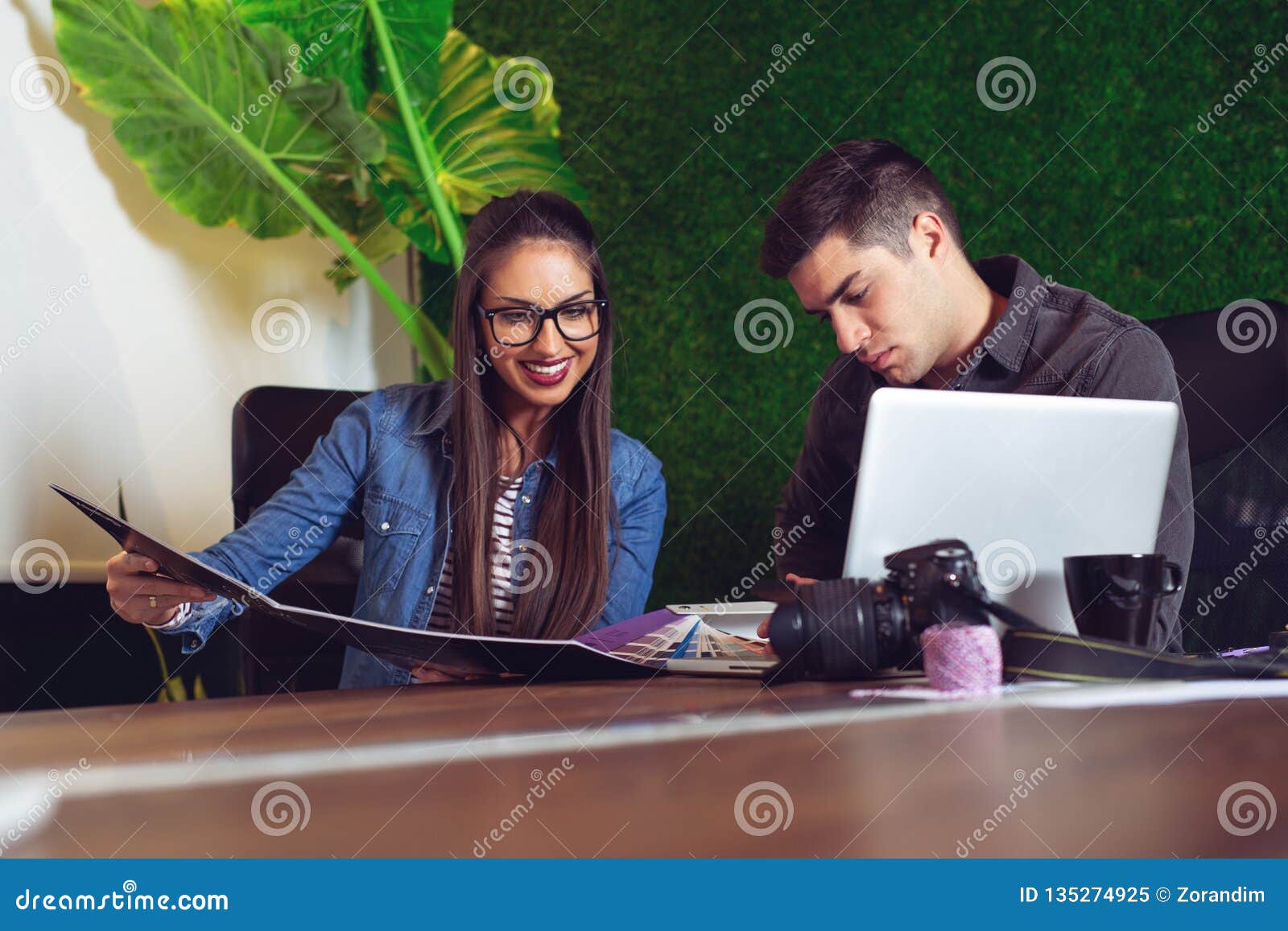 Successful Female Interior Designer Working on a New Project with a ...