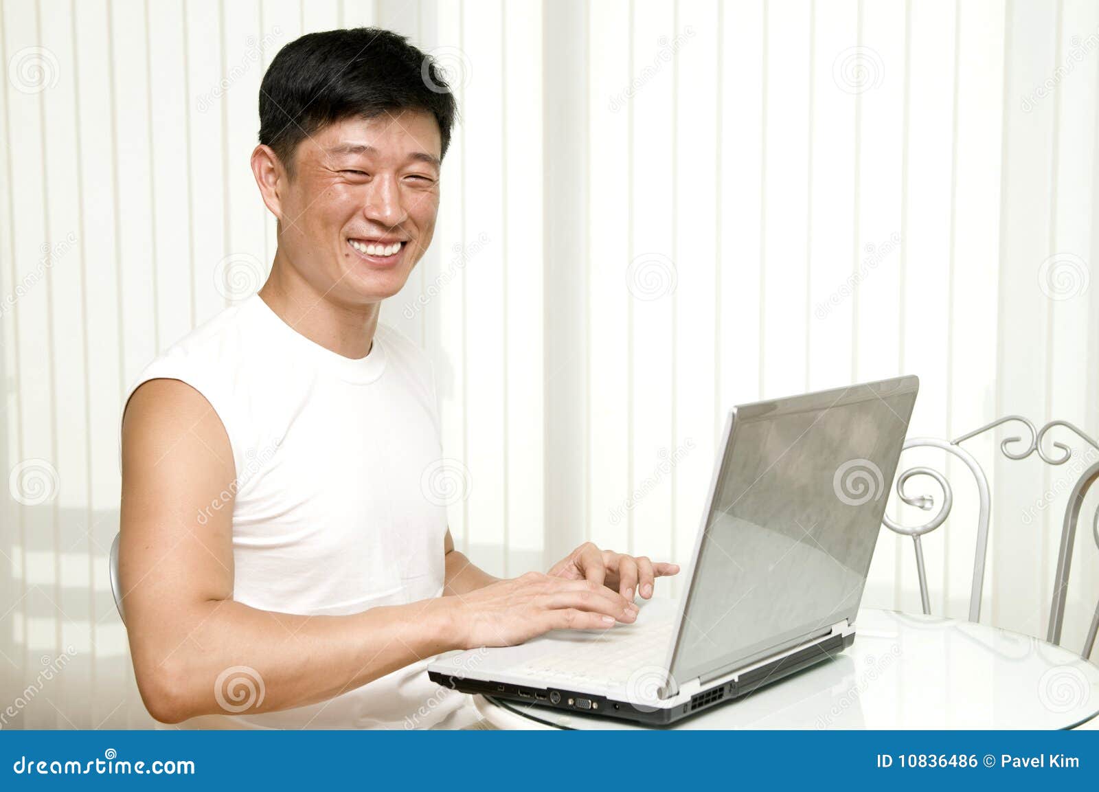 The Young Successful Man with the Computer. Stock Photo - Image of ...