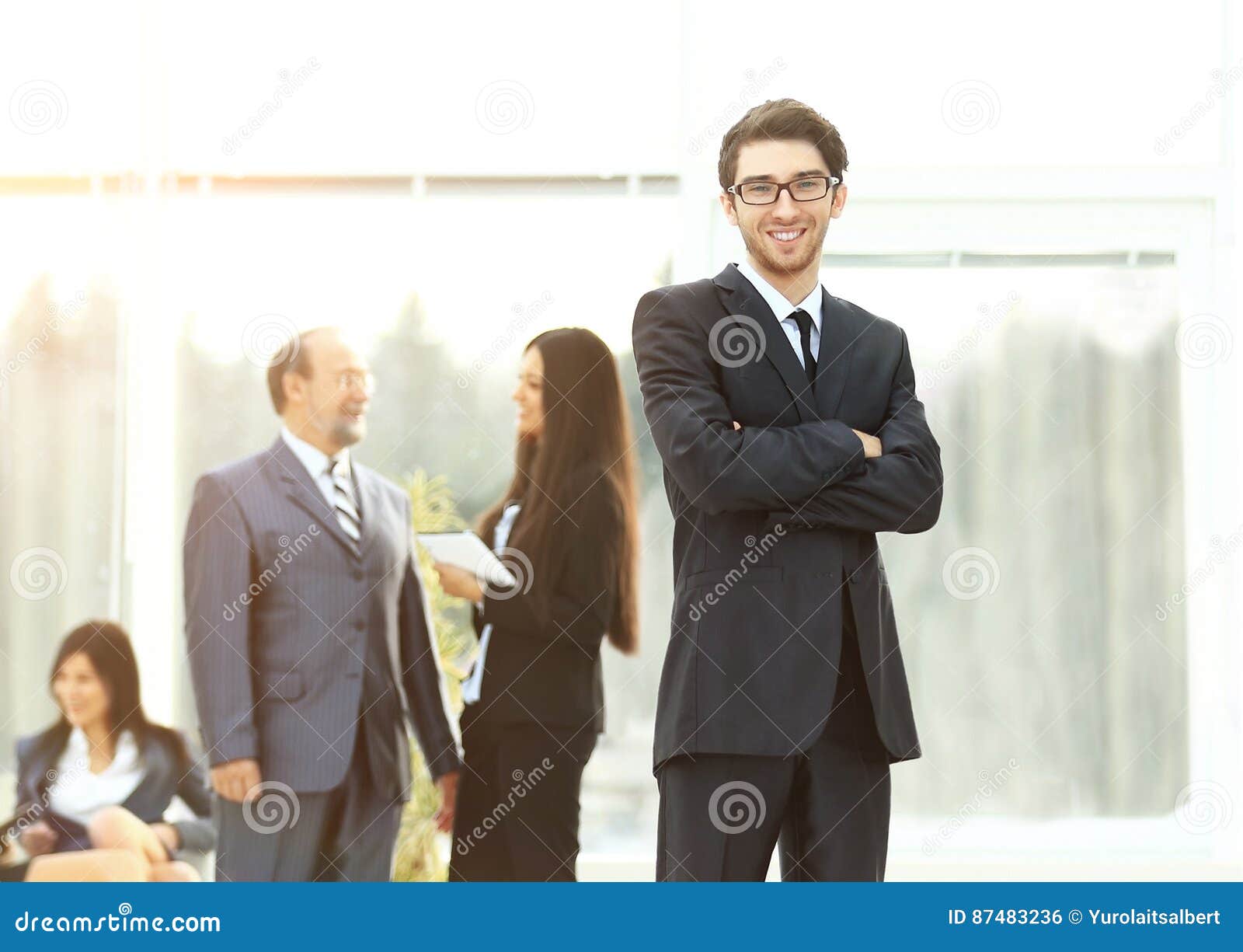 Young Successful Manager in the Background Business Team in the Office ...