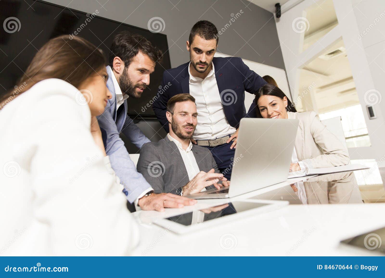 Young Successful Managers Discussing New Business Project Stock Photo ...
