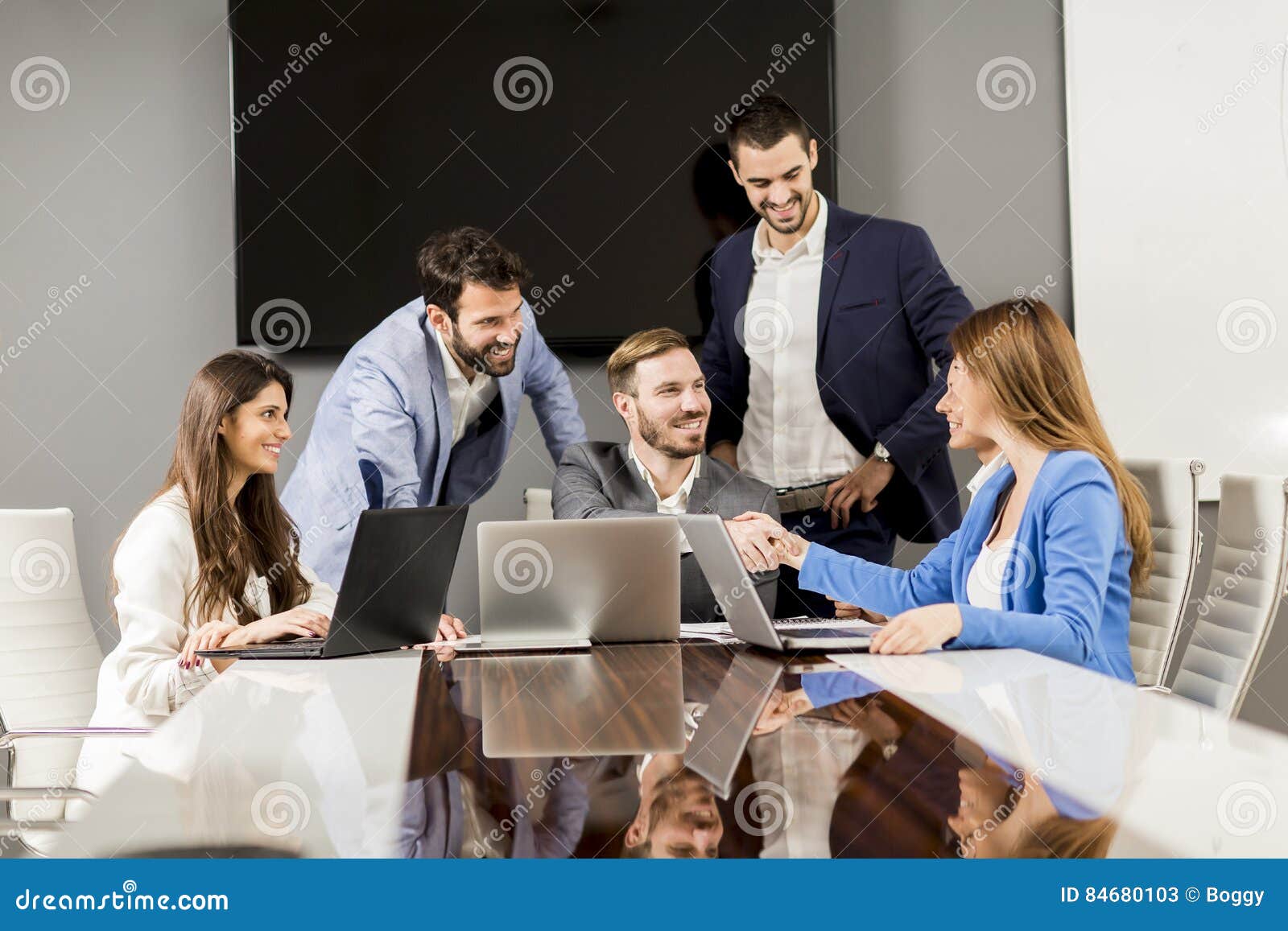 Young Successful Managers Discussing New Business Project Stock Image ...