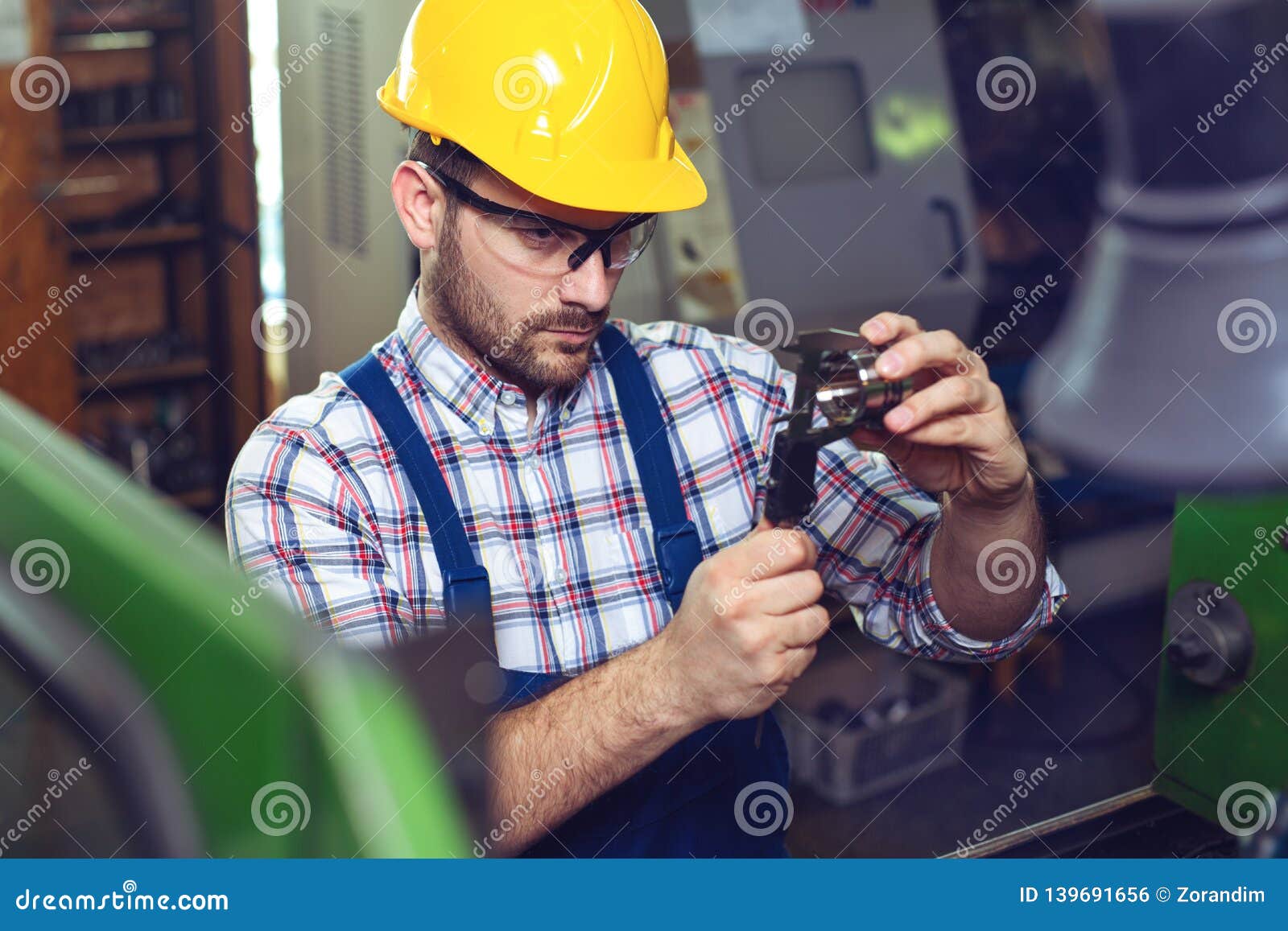 Supervisor Doing Quality Control and Production Check in Factory Stock ...