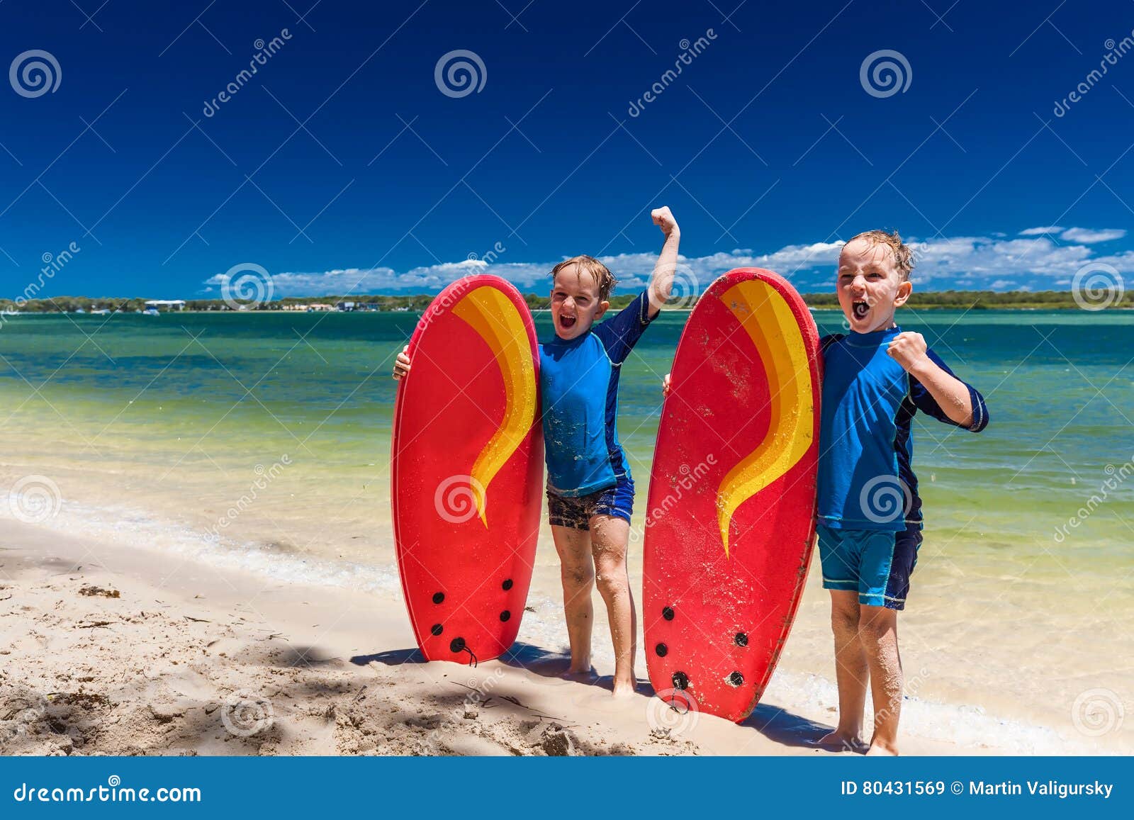 Young Surfer Brothers Have Fun on Beach Learning To Surf Stock Image ...