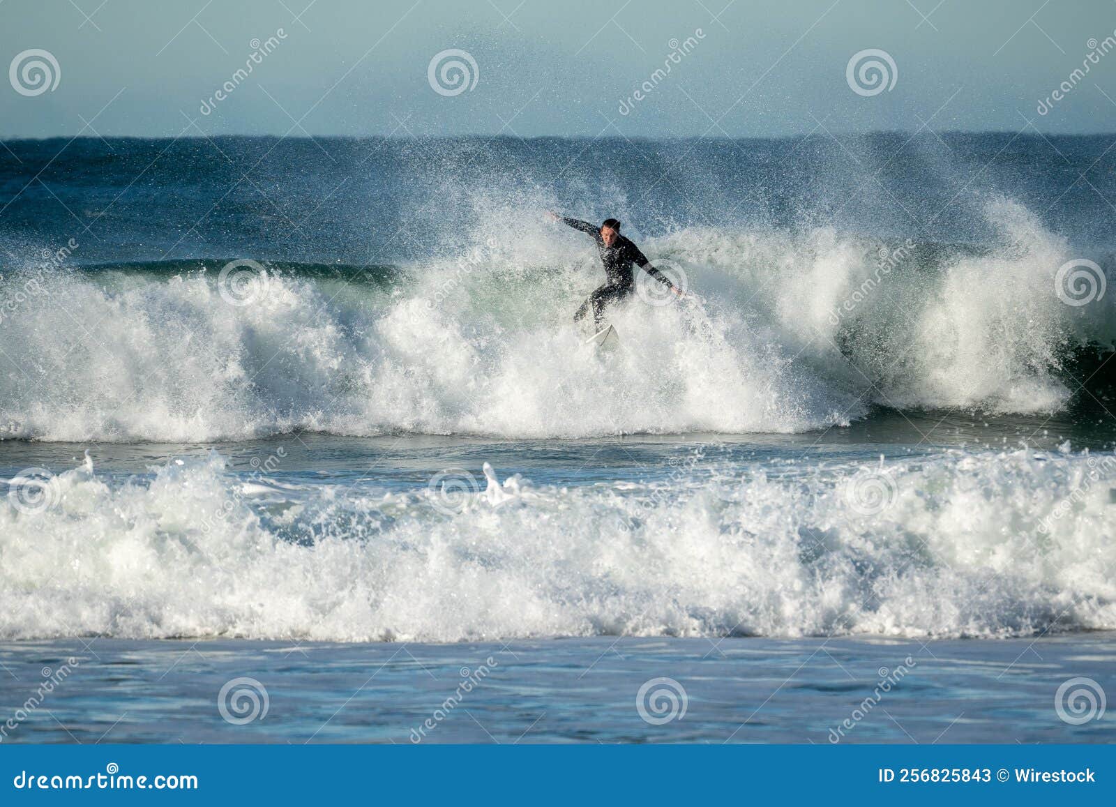 Young Surfer Catching Waves before Work on an Early Friday Morning at ...