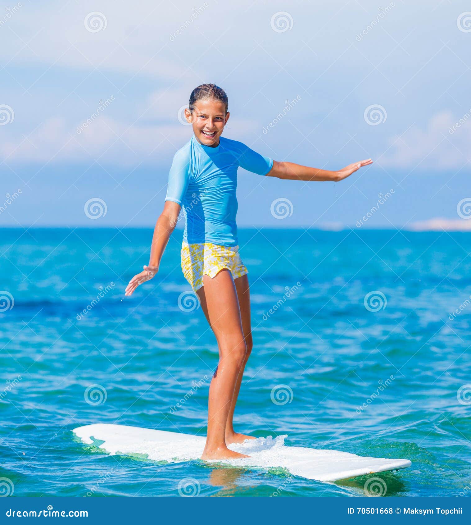 Young surfer girl stock photo. Image of beach, shore - 70501668
