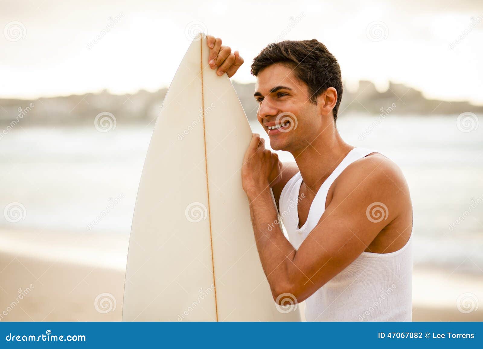 Young Surfer Standing with His Surfboard Stock Photo - Image of ...