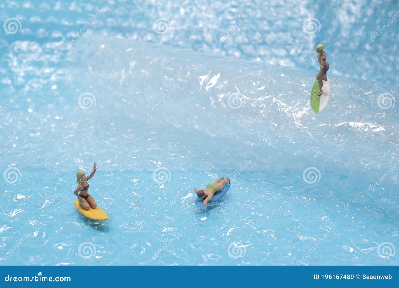 A Young Surfers Figure on the Sea, the Waves before Riding it Stock ...