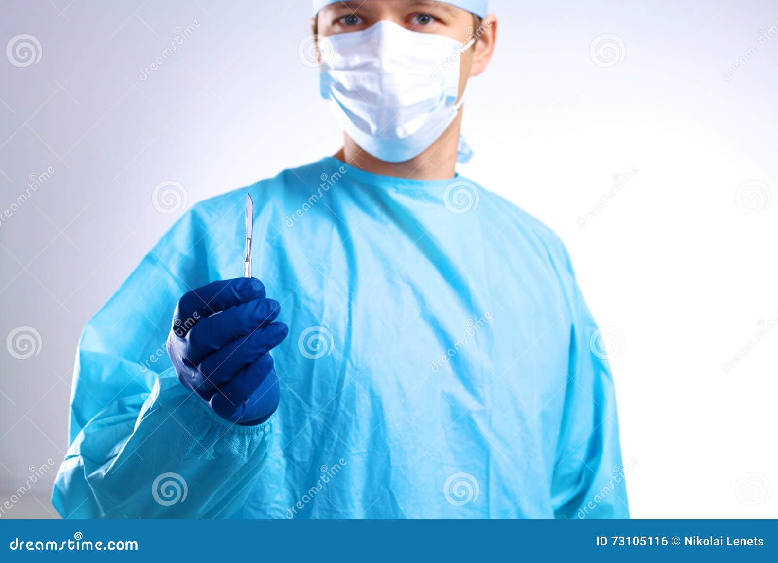 Young Surgeon Holding a Scalpel. Ready for Operation Stock Photo ...