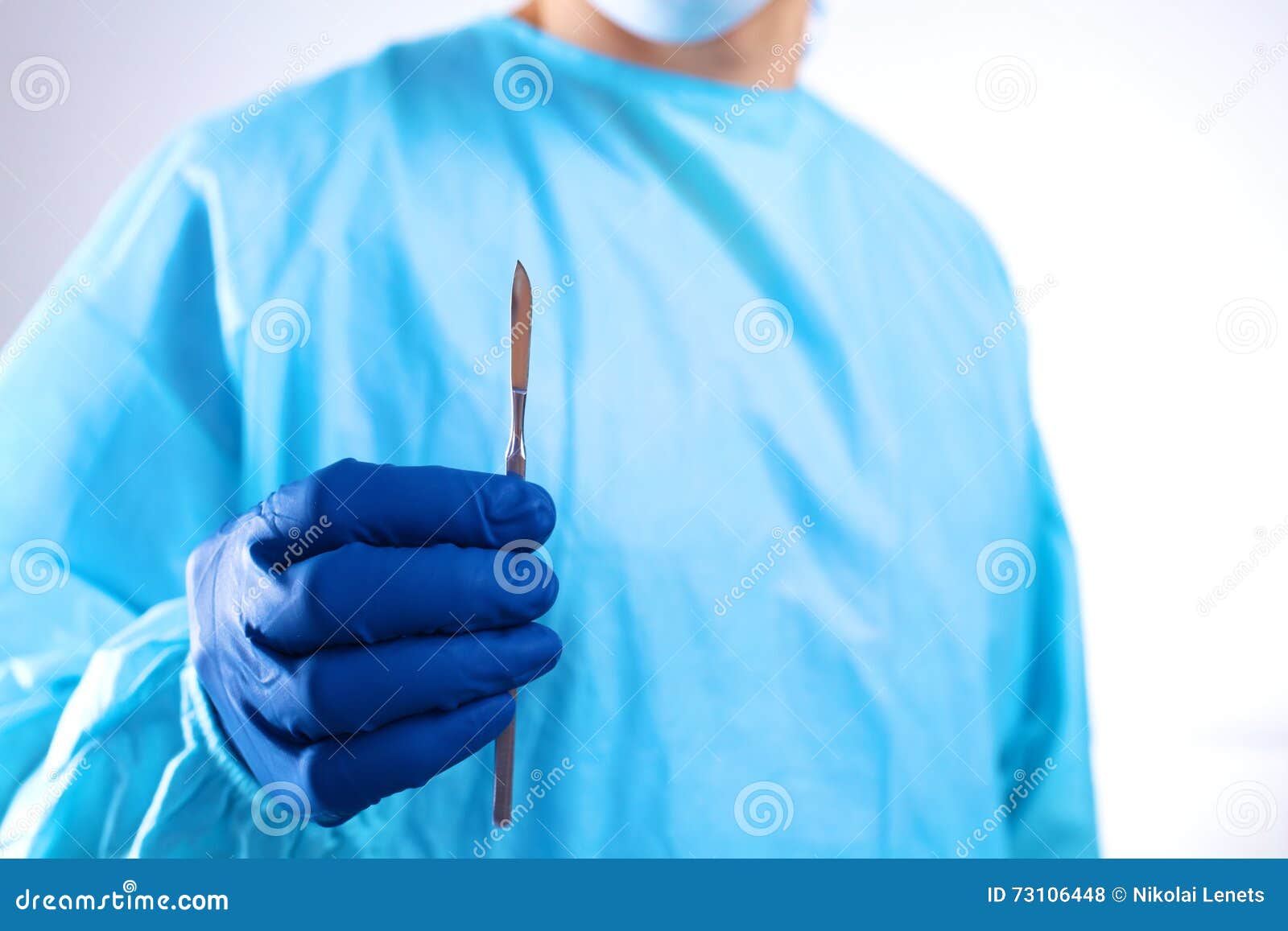 Young Surgeon Holding a Scalpel. Ready for Operation Stock Photo ...