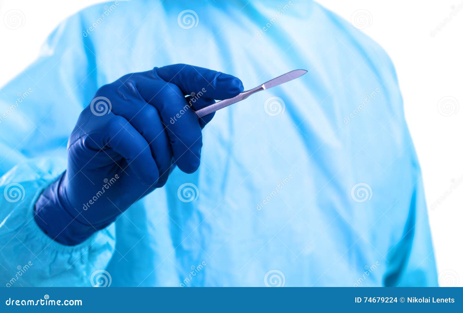 Young Surgeon Holding a Scalpel. Ready for Operation Stock Photo ...