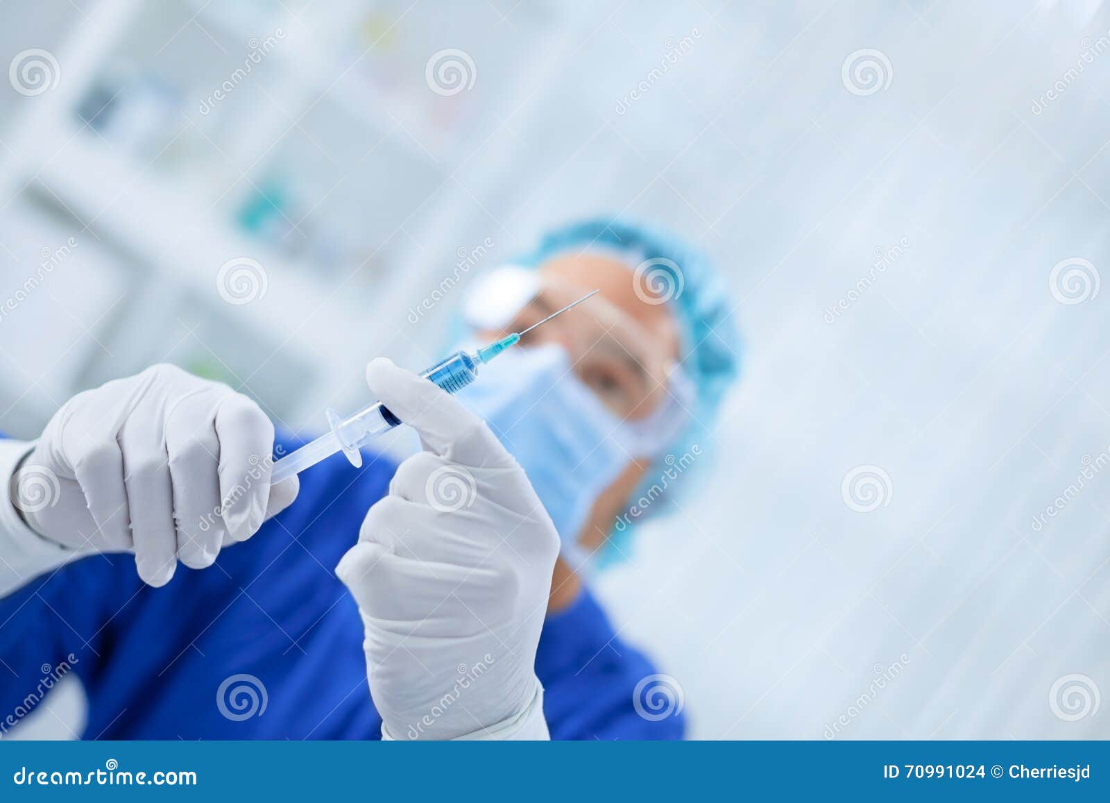 Young Surgeon Looking at Needle Stock Photo - Image of epidemic ...