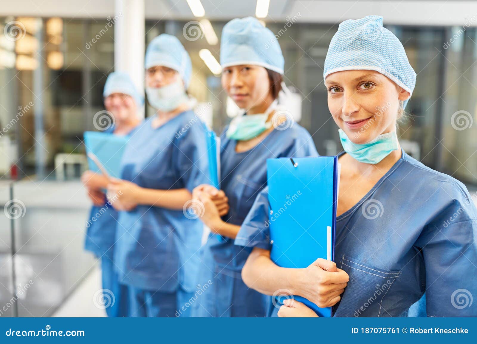 Young Surgeon in Training with Team Stock Image - Image of female ...
