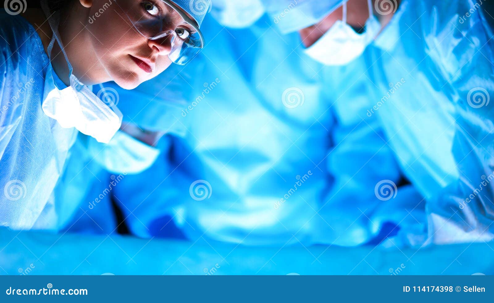 Young Surgery Team in the Operating Room Stock Photo - Image of patient ...