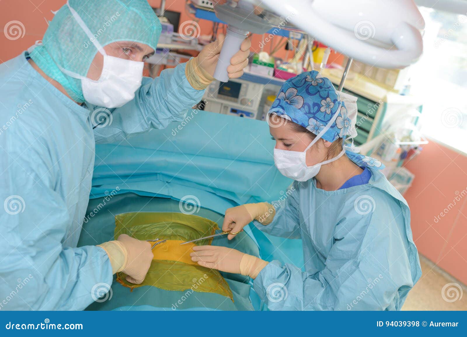 Young Surgery Team in Operating Room Stock Photo - Image of operating ...