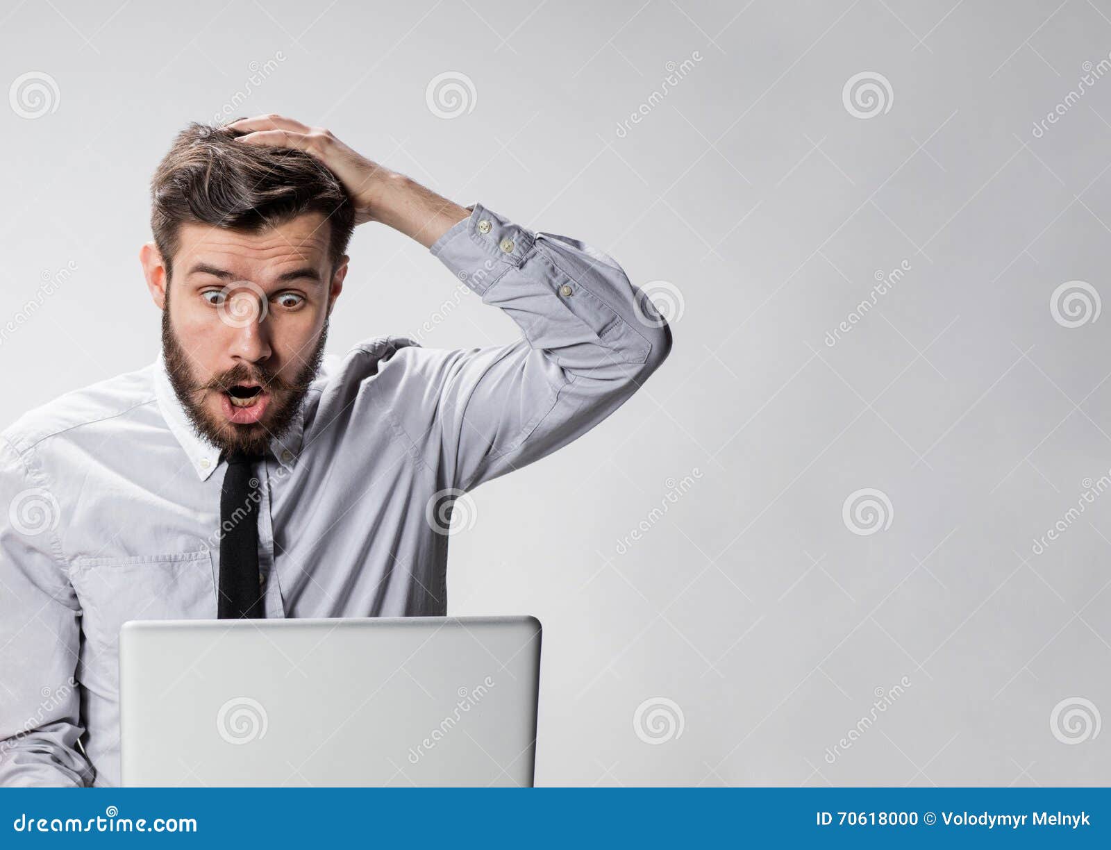 The Young Surprised Man with His Laptop Computer Stock Photo - Image of ...
