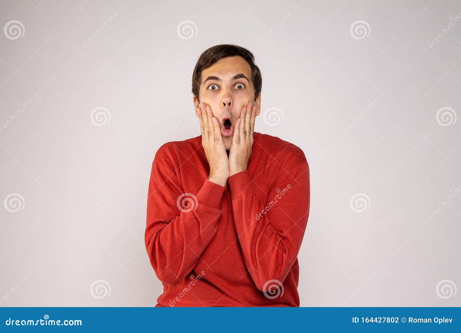 Young Surprised Man in Red Sweater Shouting WOW Stock Photo - Image of ...