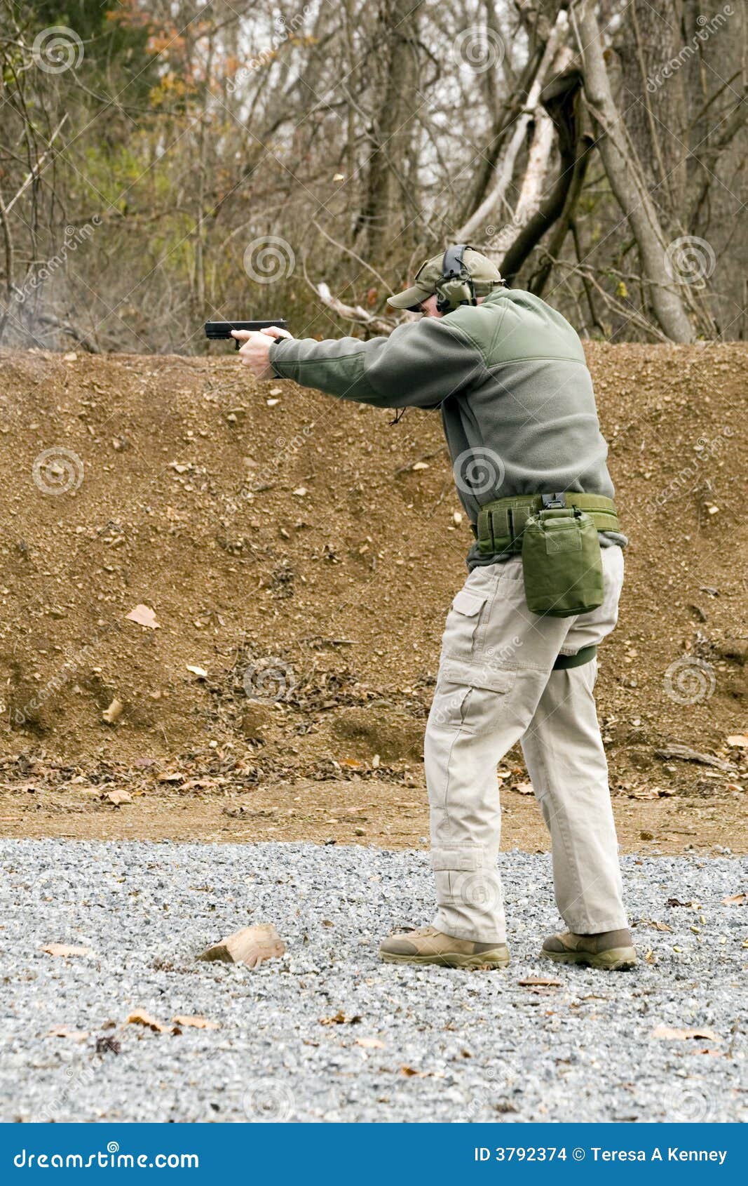 The Gunner Man Standing Long Gun Aiming Top Right Sideways With White ...