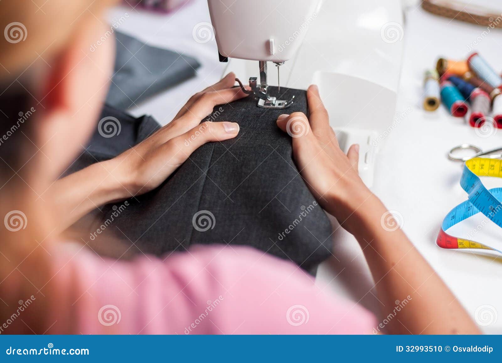 Young tailor working stock photo. Image of meter, hand - 32993510