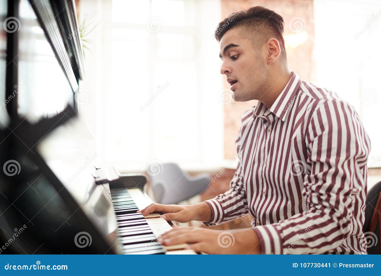 Talented guy stock image. Image of piano, singing, handsome - 107730441
