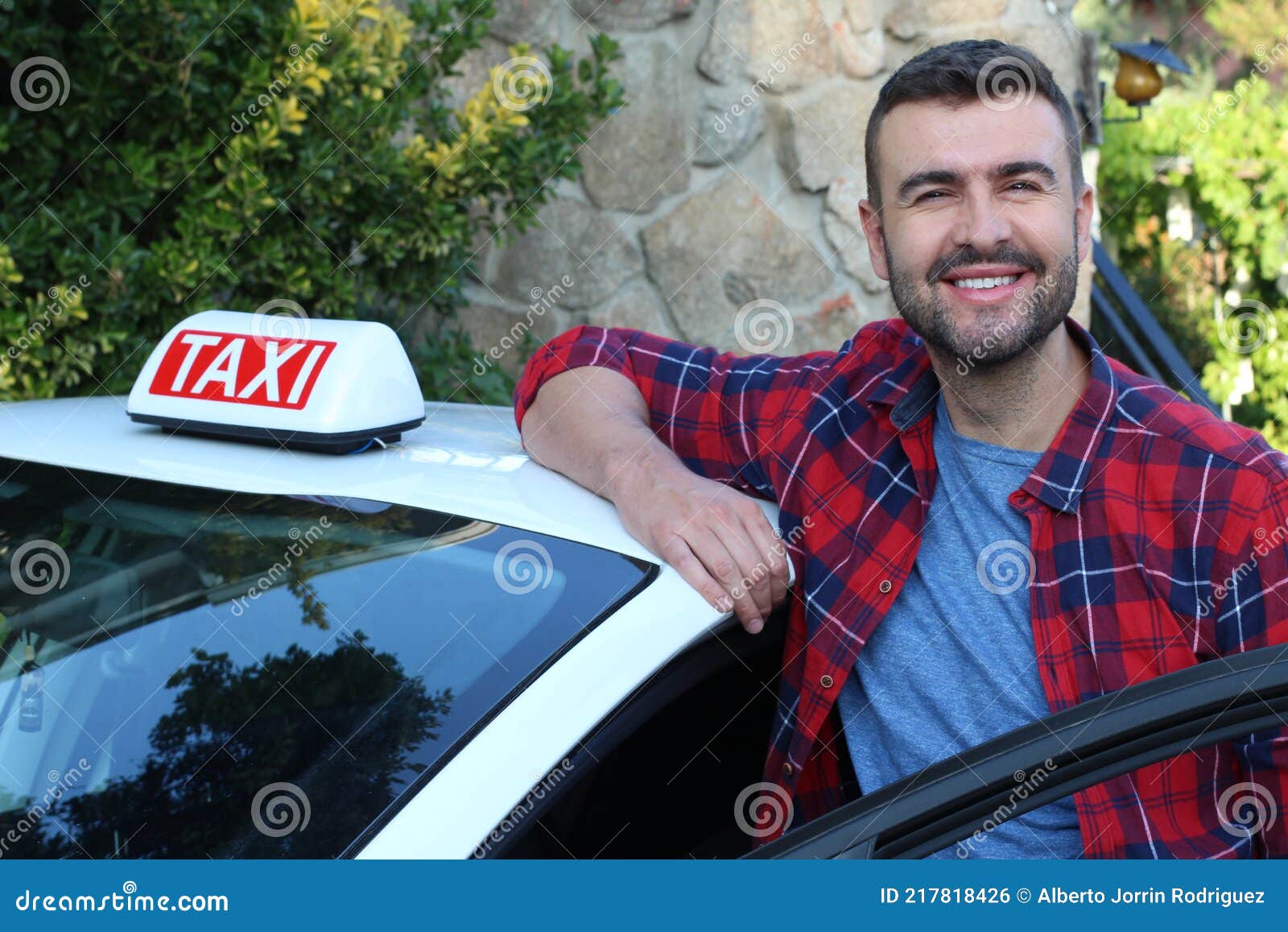Young taxi driver at work stock photo. Image of driver - 217818426