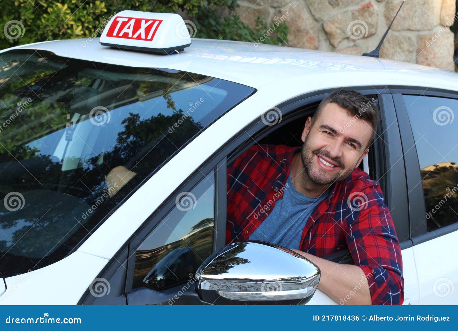 Young taxi driver at work stock photo. Image of european - 217818436