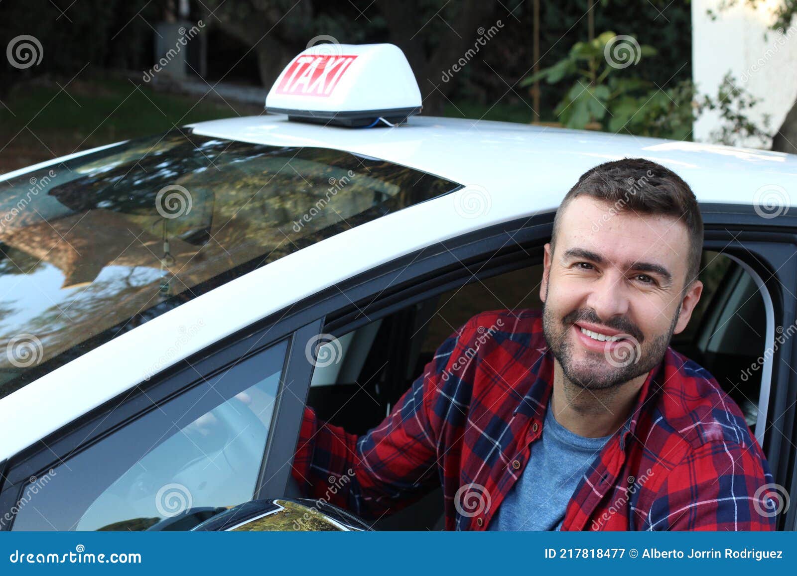 Young taxi driver at work stock image. Image of road - 217818477