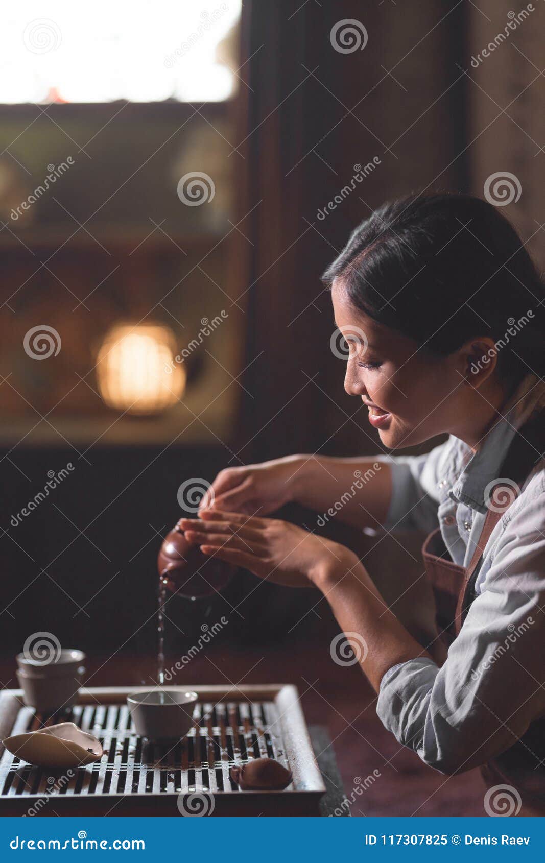 Young Tea Master Pouring Tea Stock Image - Image of master, hand: 117307825